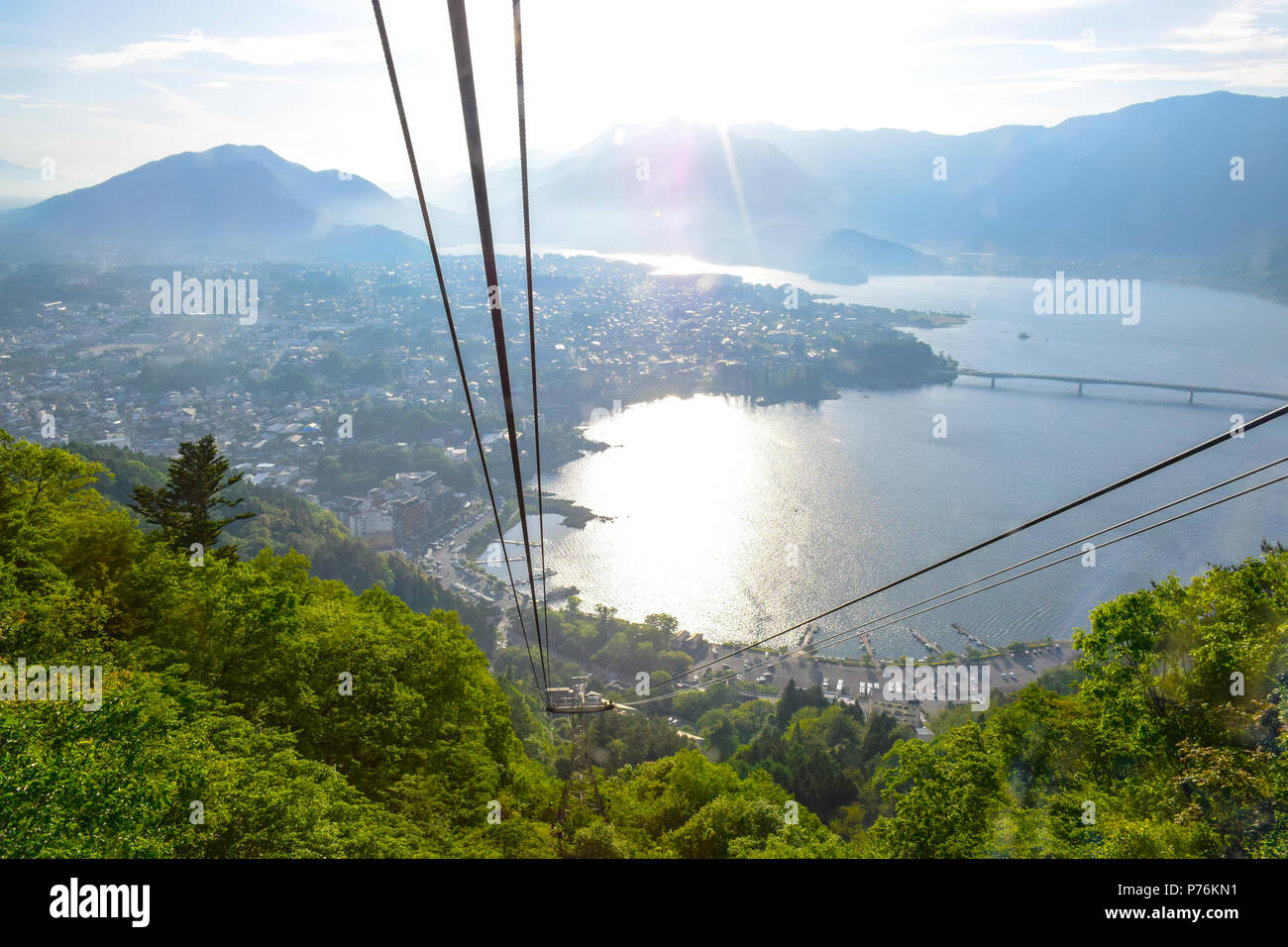 Kachi Kachi Ropeway going up to mount Tenjo Yama`s peak towards lake Kawaguchiko in Yamanashi ...